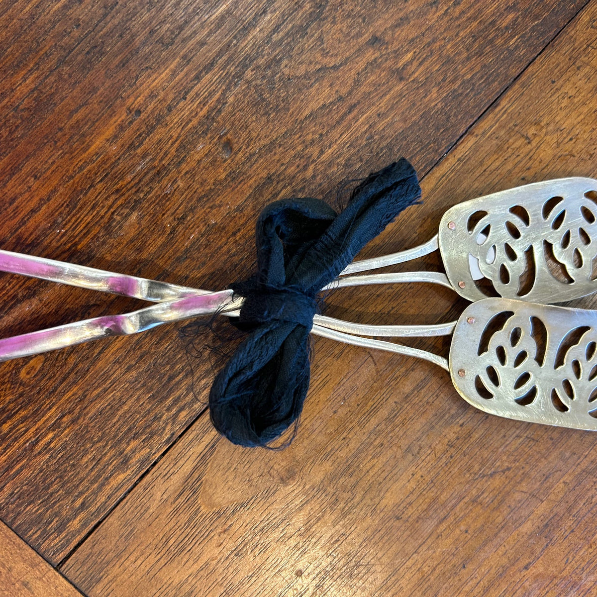 Salad servers made from upcycled silverplate. 4 – Ferris Wheel